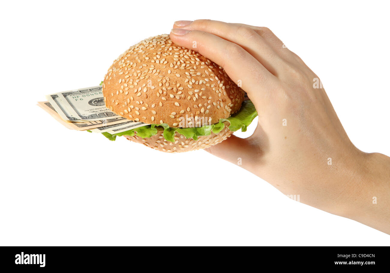 Hamburger with money in hand on white background Stock Photo - Alamy