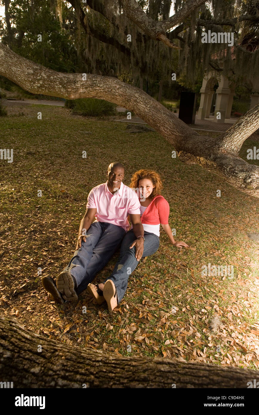 Man sitting under oak tree hi-res stock photography and images - Alamy