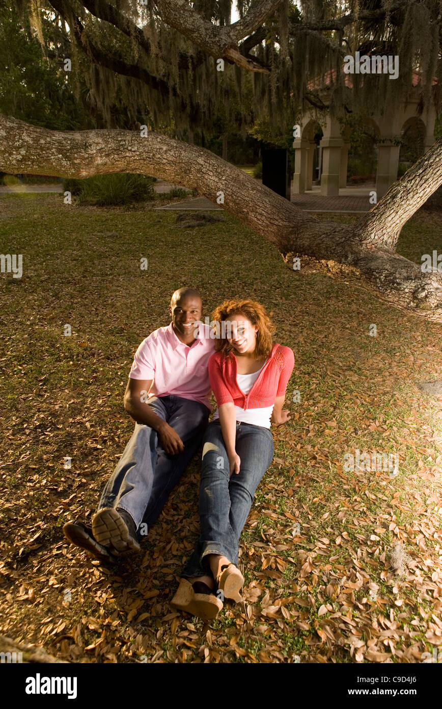 Man sitting under oak tree hi-res stock photography and images - Alamy