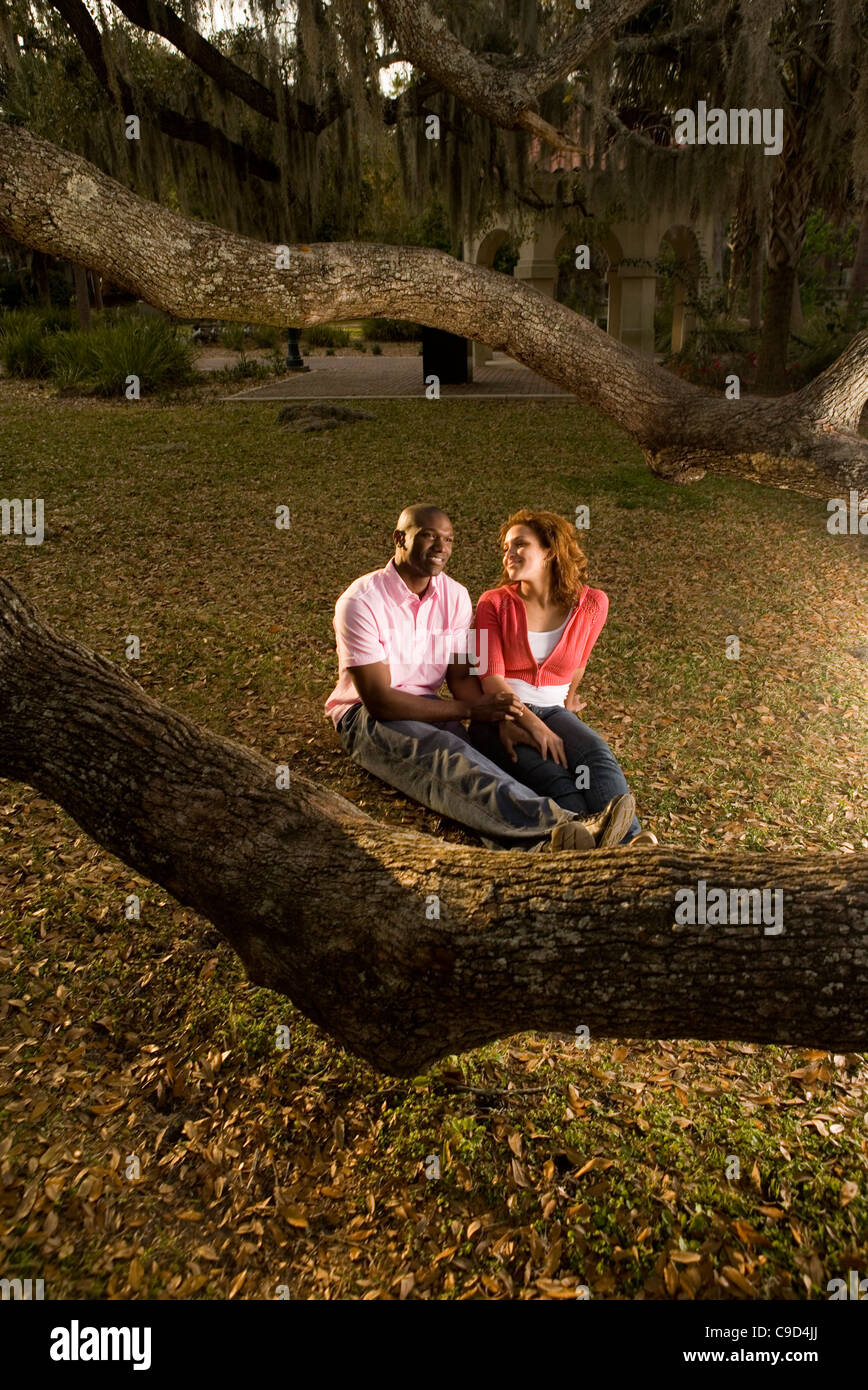 Man sitting under oak tree hi-res stock photography and images - Alamy