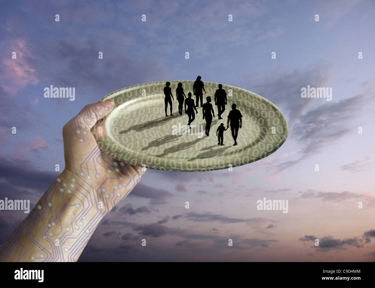 Miniature figures of people on a plate held by a person Stock Photo - Alamy