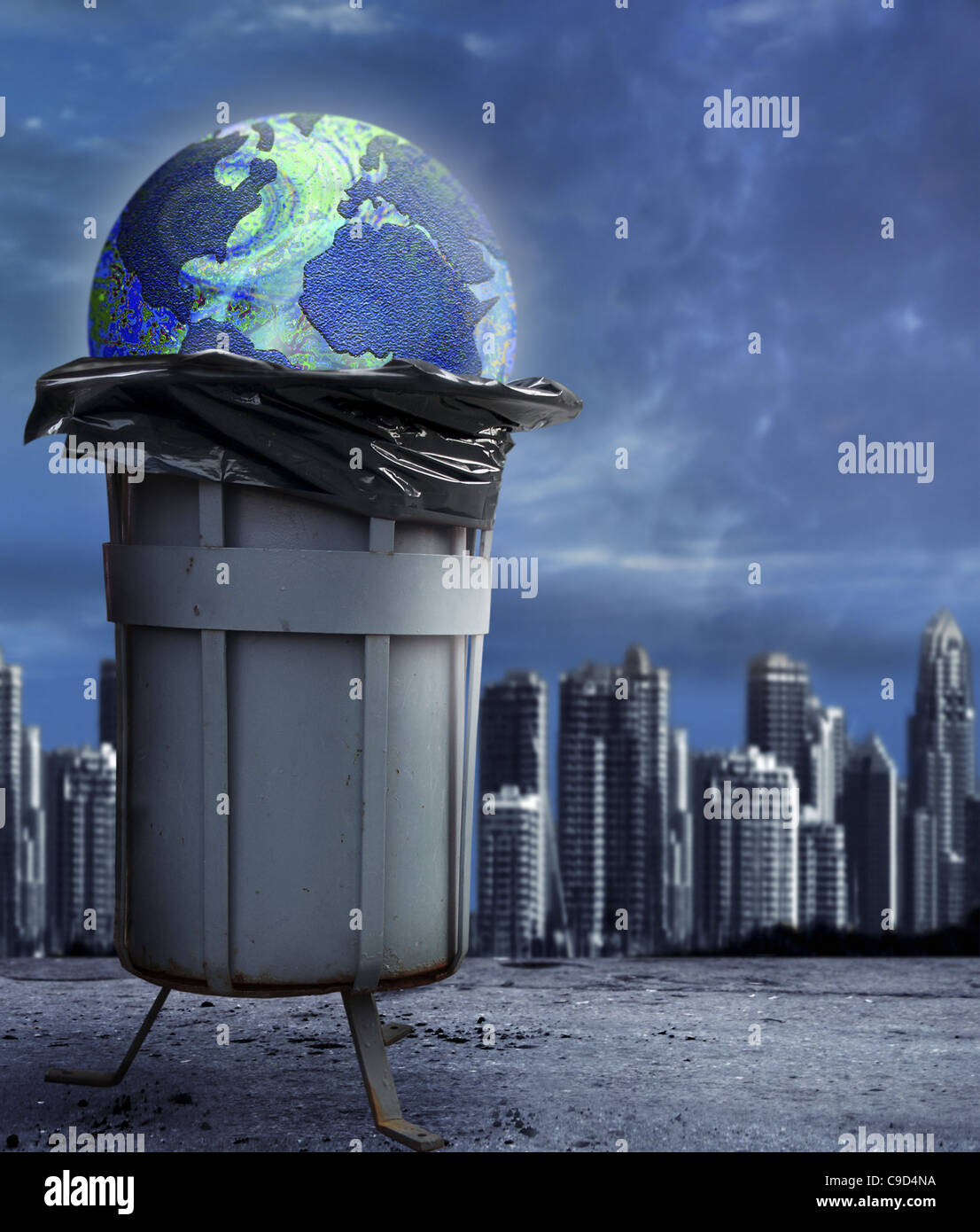 Trash bin with a globe Stock Photo - Alamy
