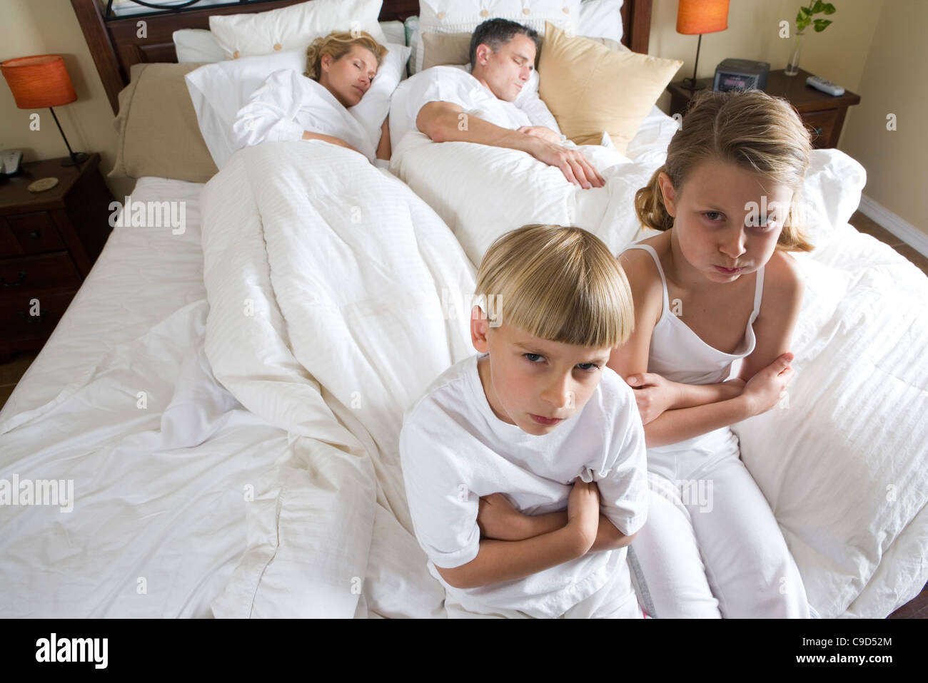Children waiting for parents to wake up Stock Photo - Alamy
