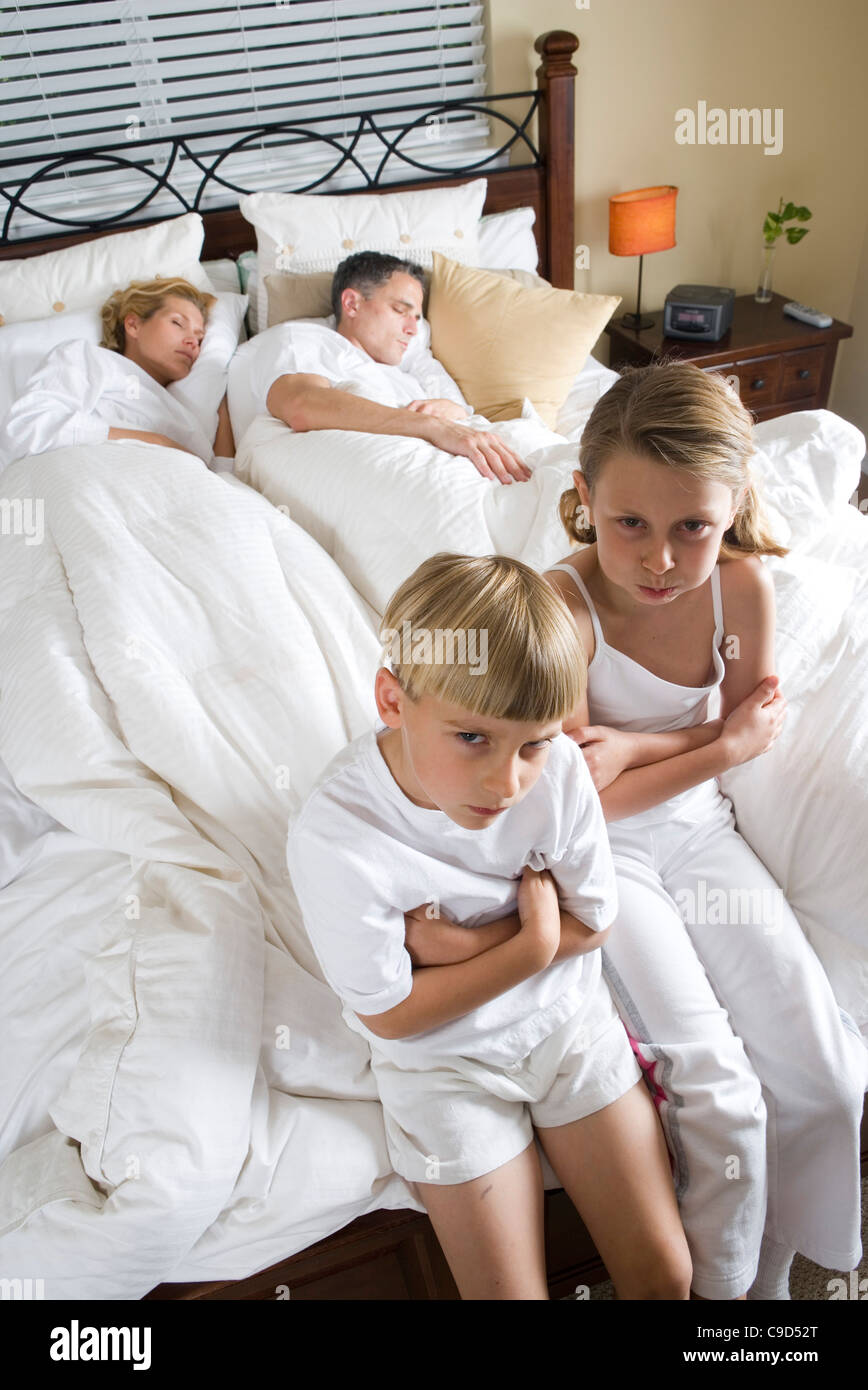 Children waiting for parents to wake up Stock Photo - Alamy