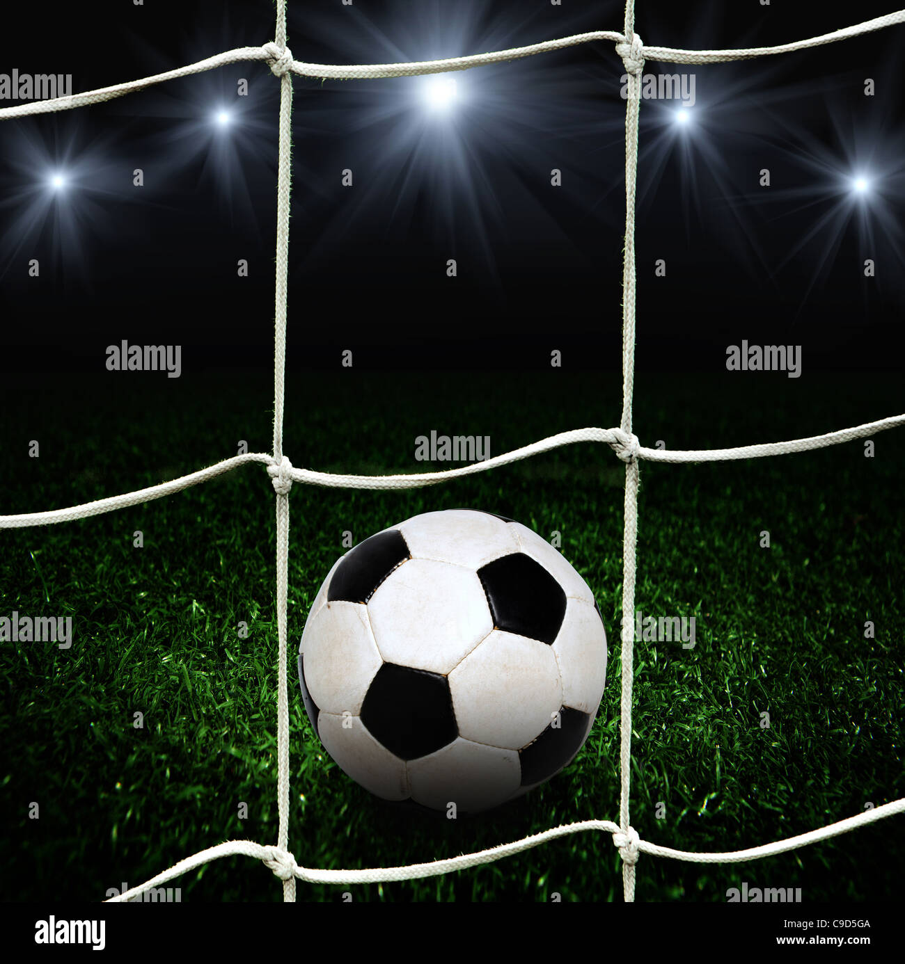 Soccer ball on the stadium field hi-res stock photography and images ...