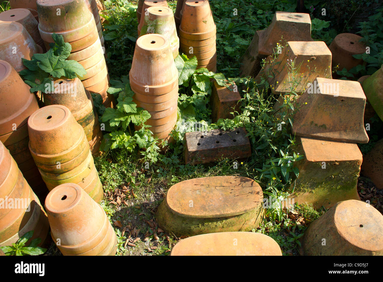 Stacked earthen pots hi-res stock photography and images - Alamy