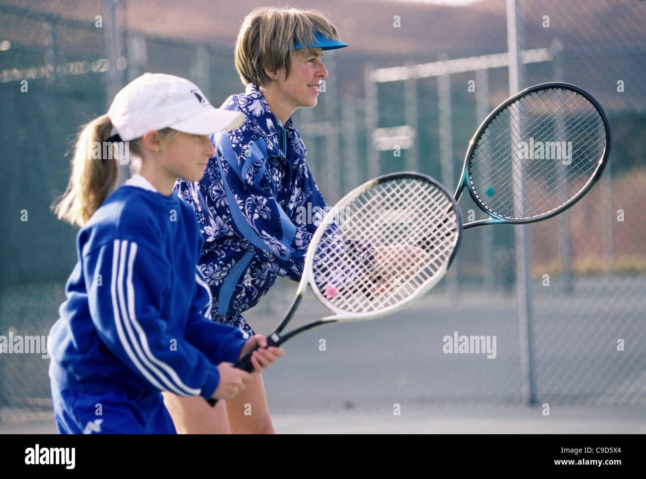 Women learning tennis hi-res stock photography and images - Alamy