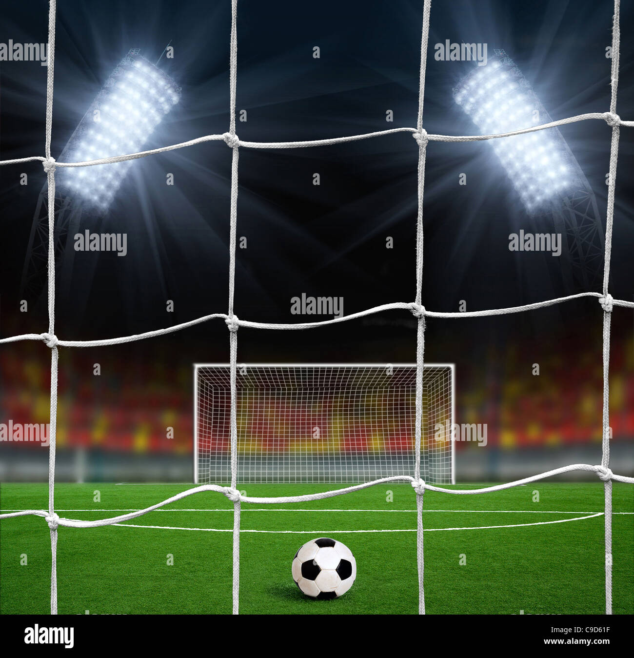 Green football ground against the sky Stock Photo - Alamy