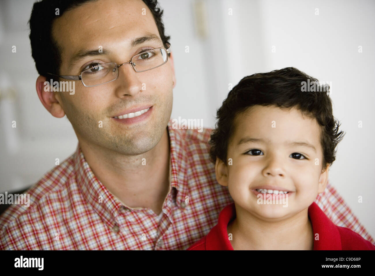 Portrait of a father and a son Stock Photo - Alamy