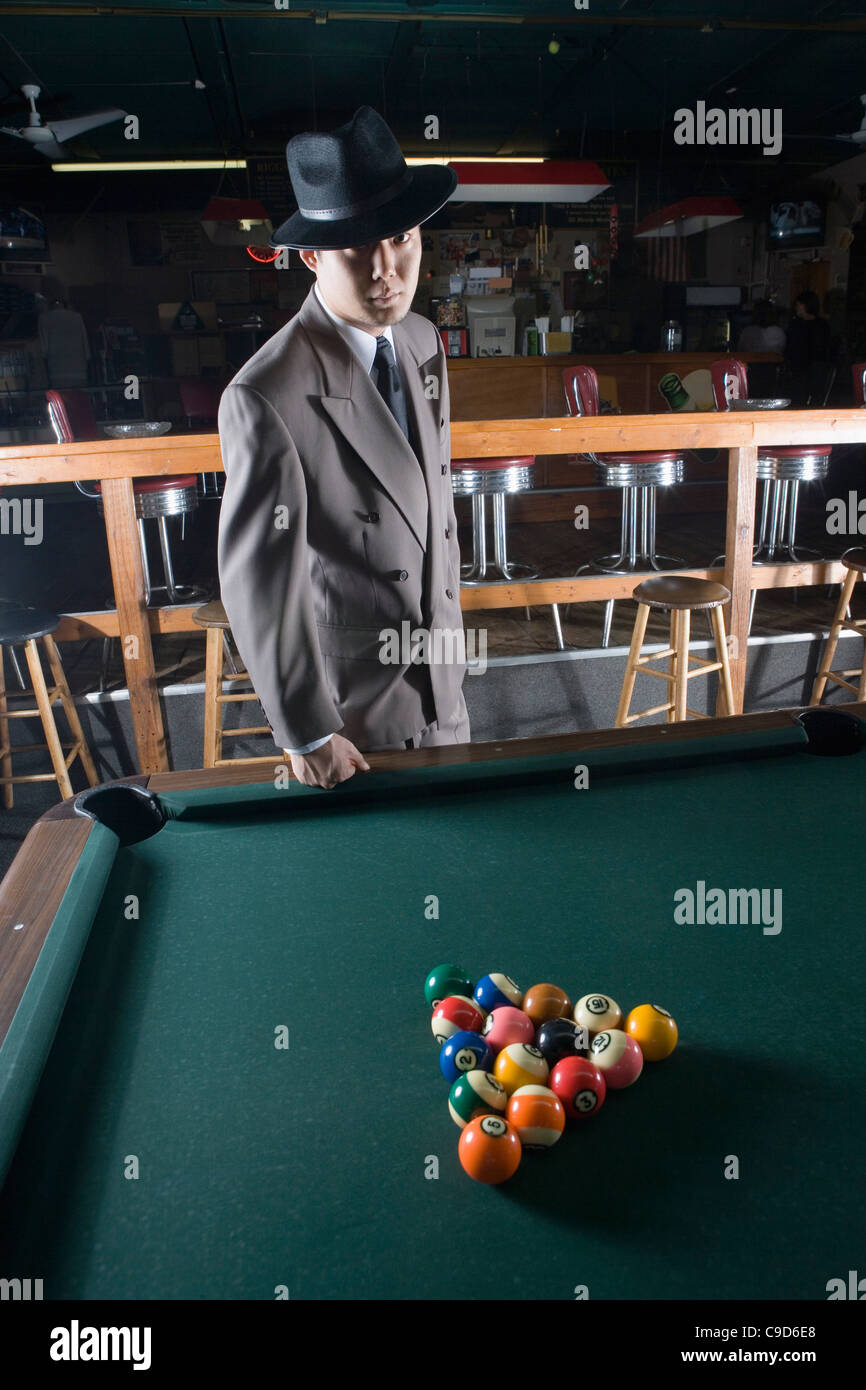 Gangster in a pool hall Stock Photo - Alamy