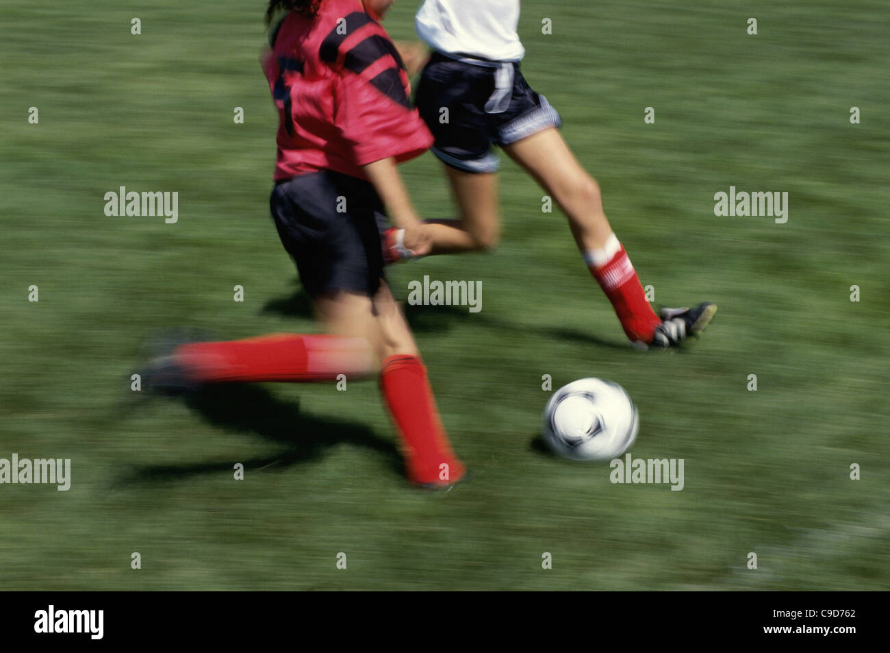 High angle view of two people playing soccer Stock Photo - Alamy