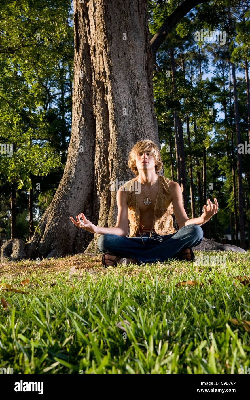 Hippie meditating outdoors hi-res stock photography and images - Alamy