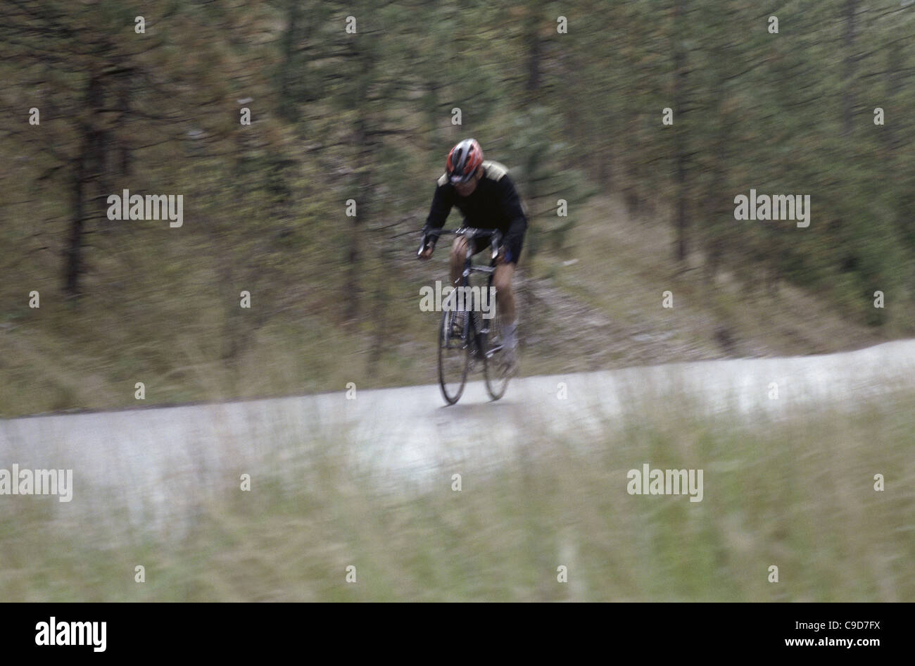Man cycling on a bicycle Stock Photo - Alamy