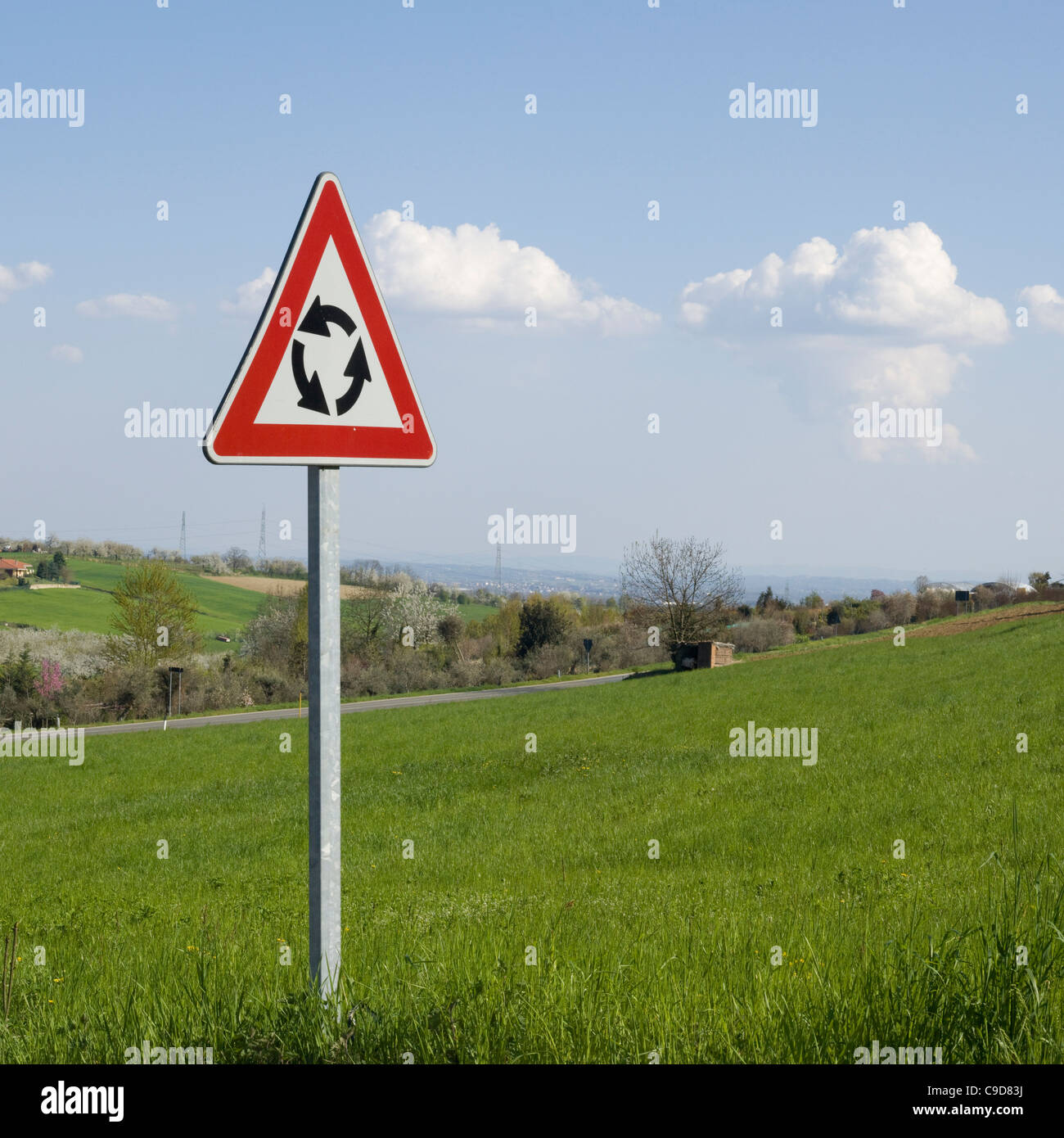 Italy, Piedmont, roundabout sign in meadow Stock Photo - Alamy