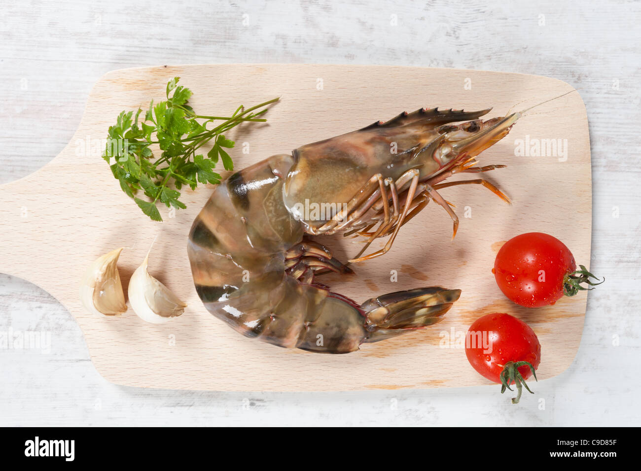 Fresh raw big prawn on woden background Stock Photo - Alamy