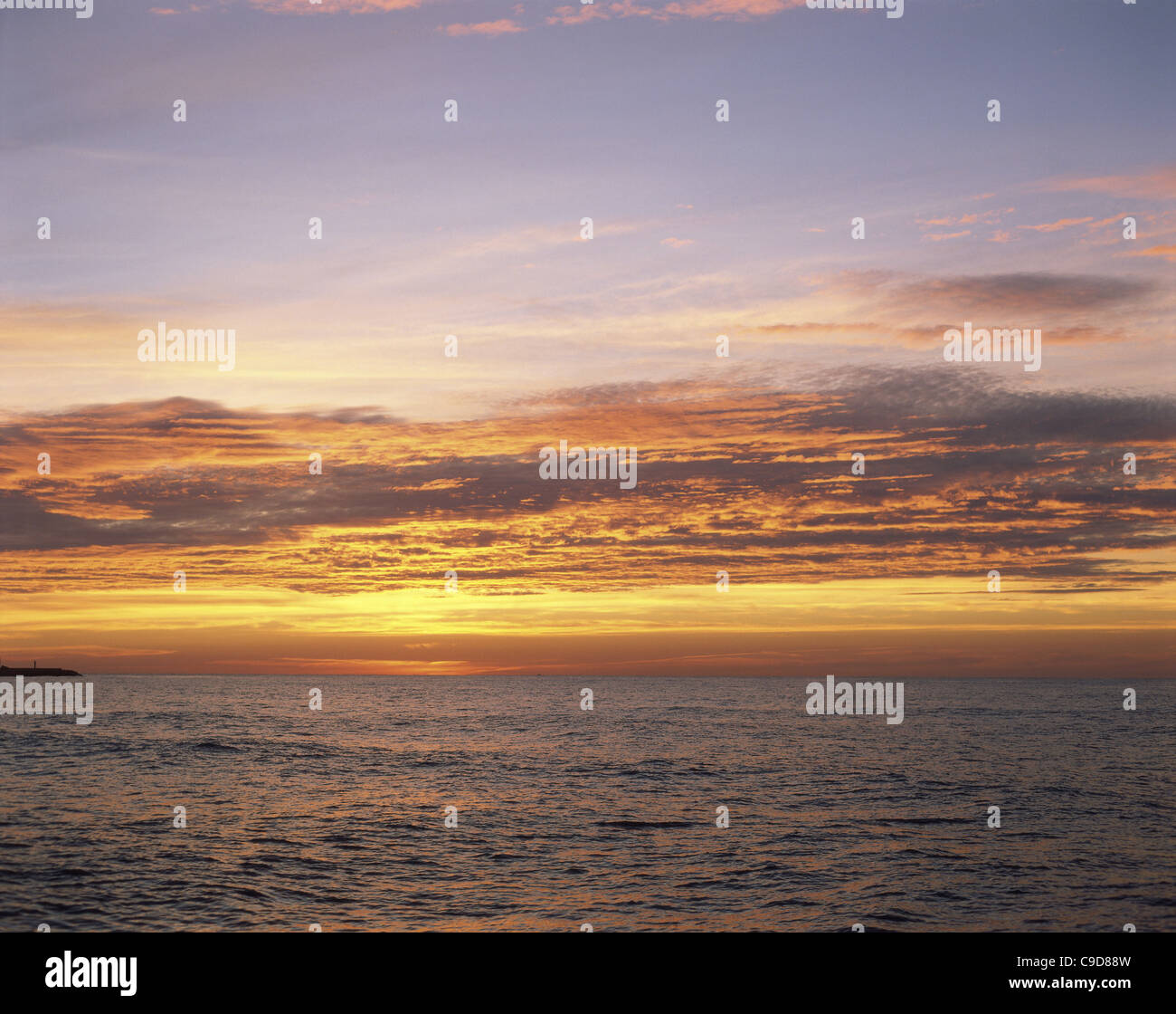 Sunrise over the ocean Stock Photo - Alamy
