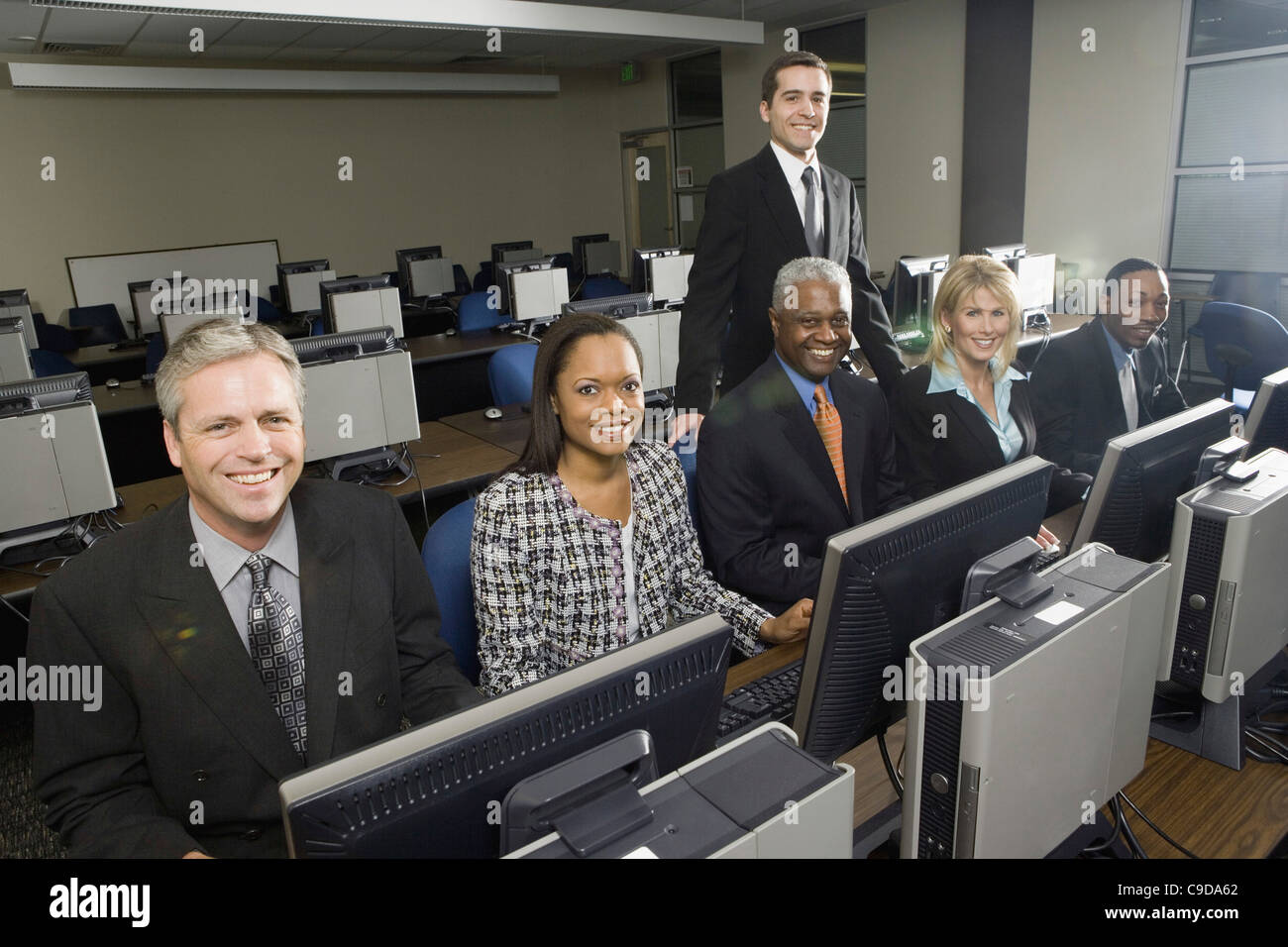 Business colleagues at a computer training seminar Stock Photo - Alamy