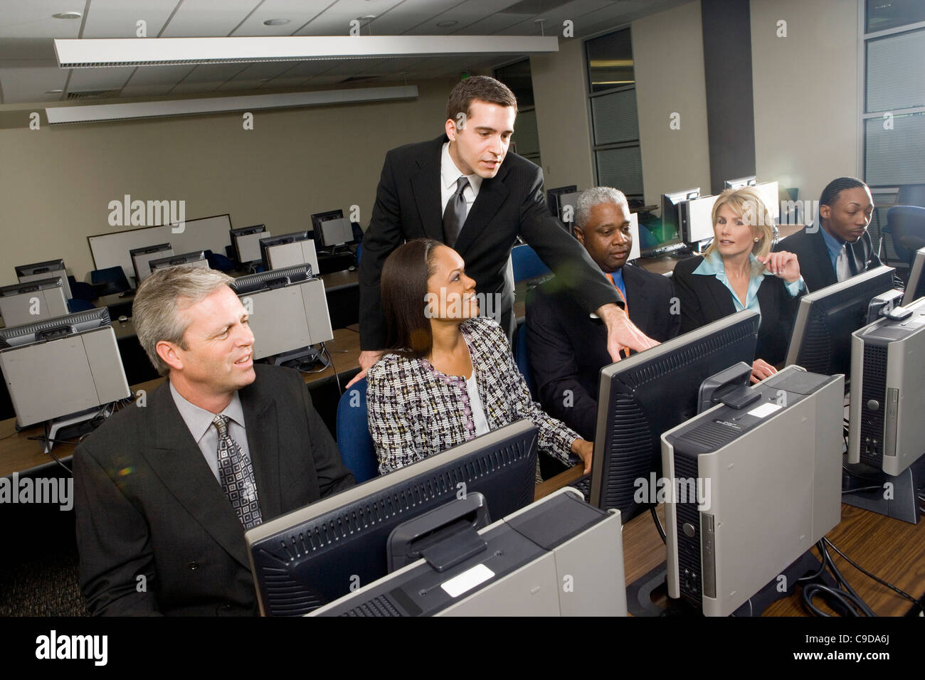 Business colleagues at a computer training seminar Stock Photo - Alamy