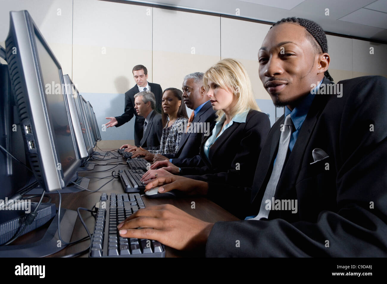 Business colleagues at a computer training seminar Stock Photo - Alamy