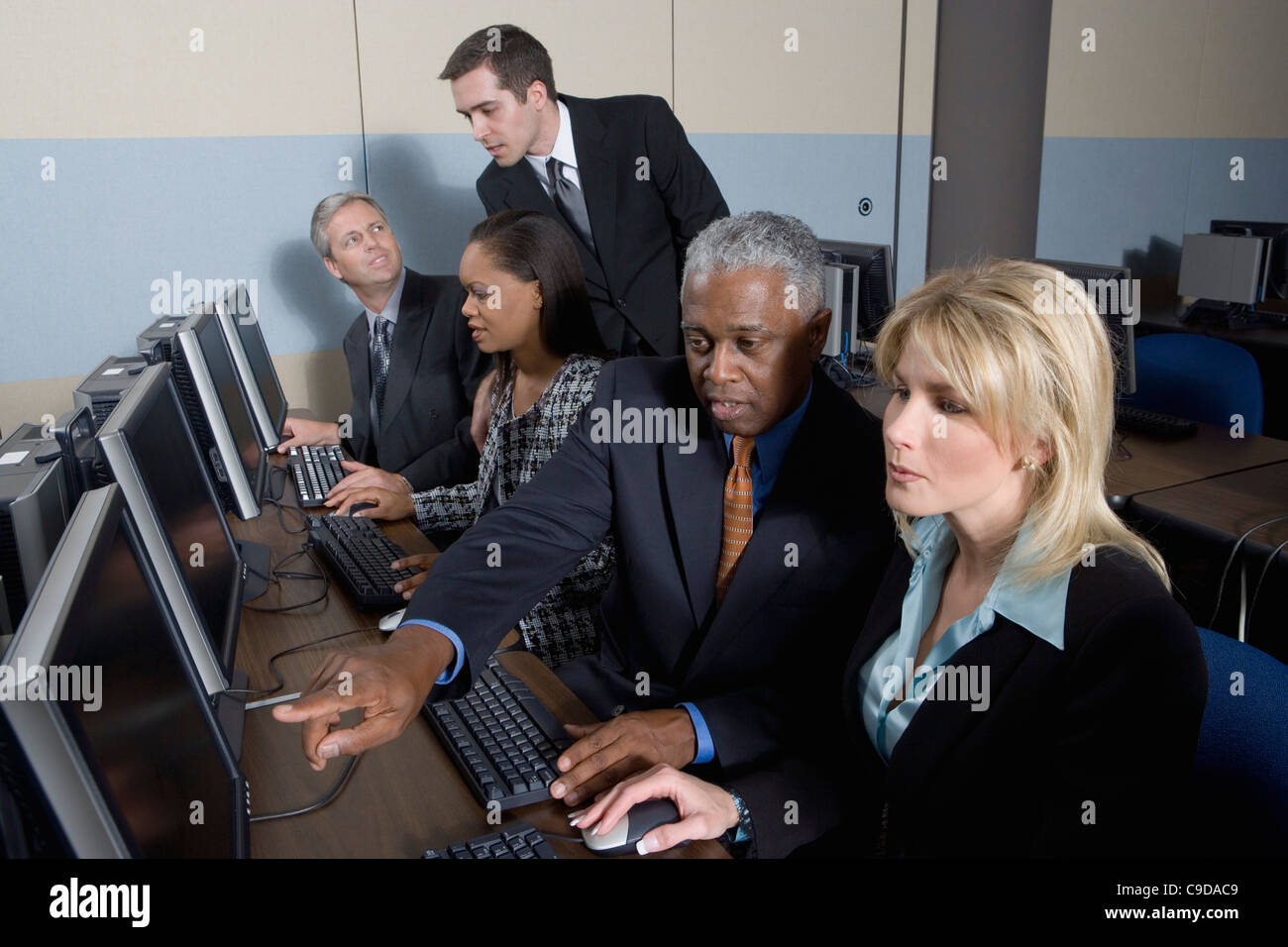 Business colleagues at a computer training seminar Stock Photo - Alamy