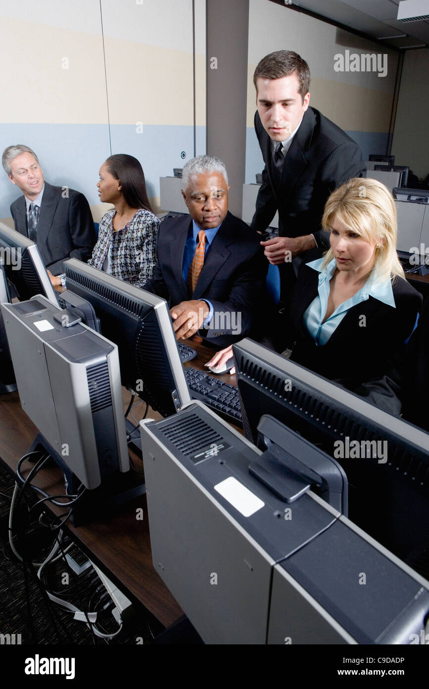 Students learn in a computer lab hi-res stock photography and images ...