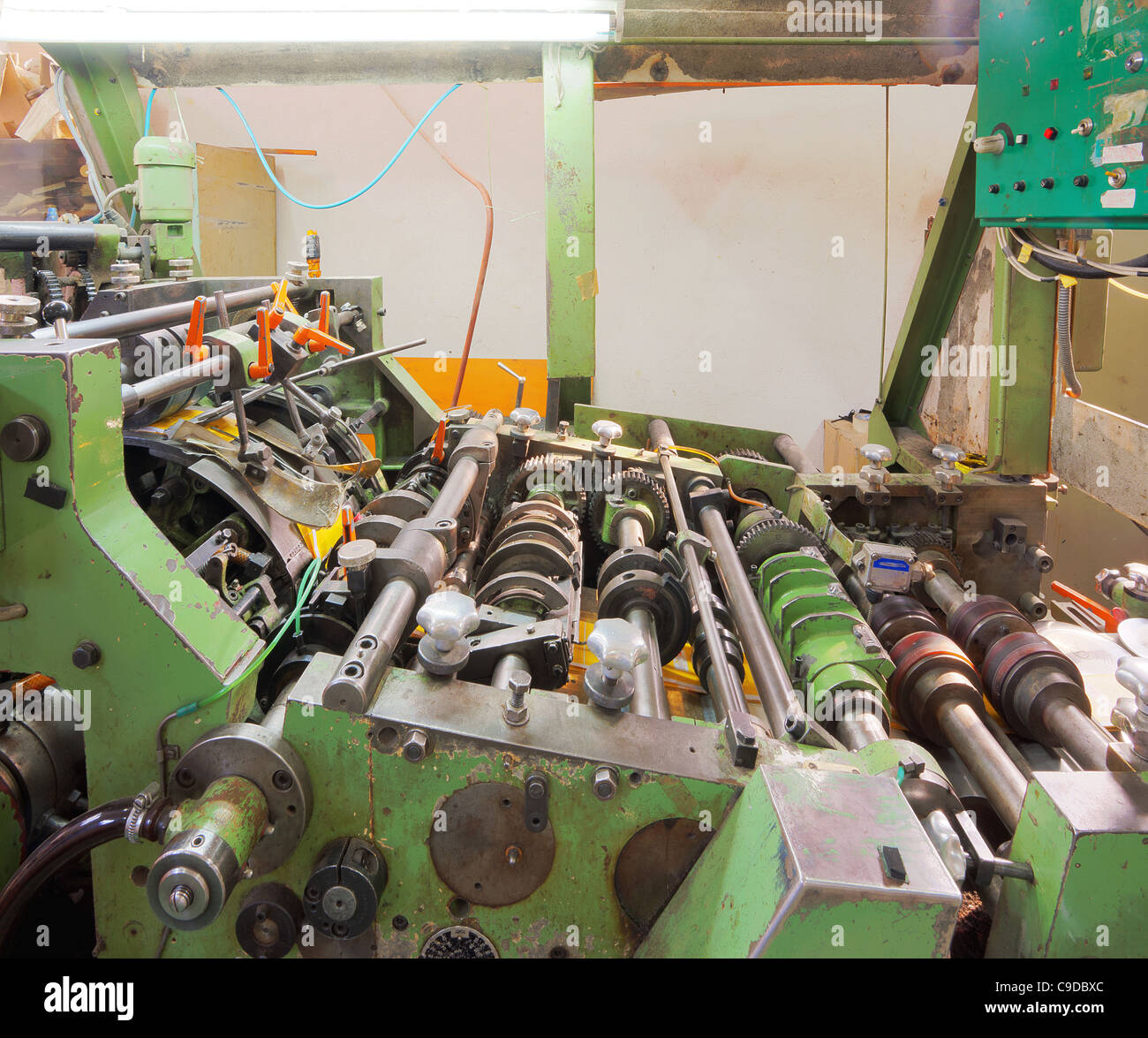 Details of a printing machine inside factory Stock Photo - Alamy