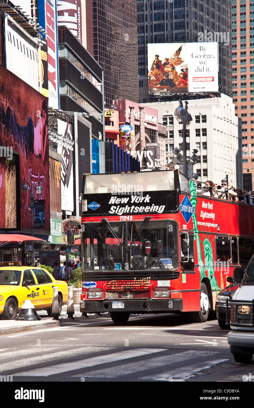 Double Decker Touring and Sightseeing Bus in Traffic, Times Square, NYC ...