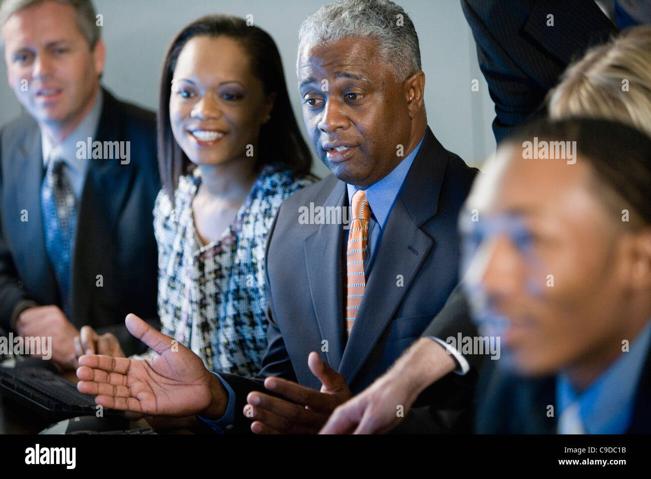 Men suits sitting row hi-res stock photography and images - Alamy