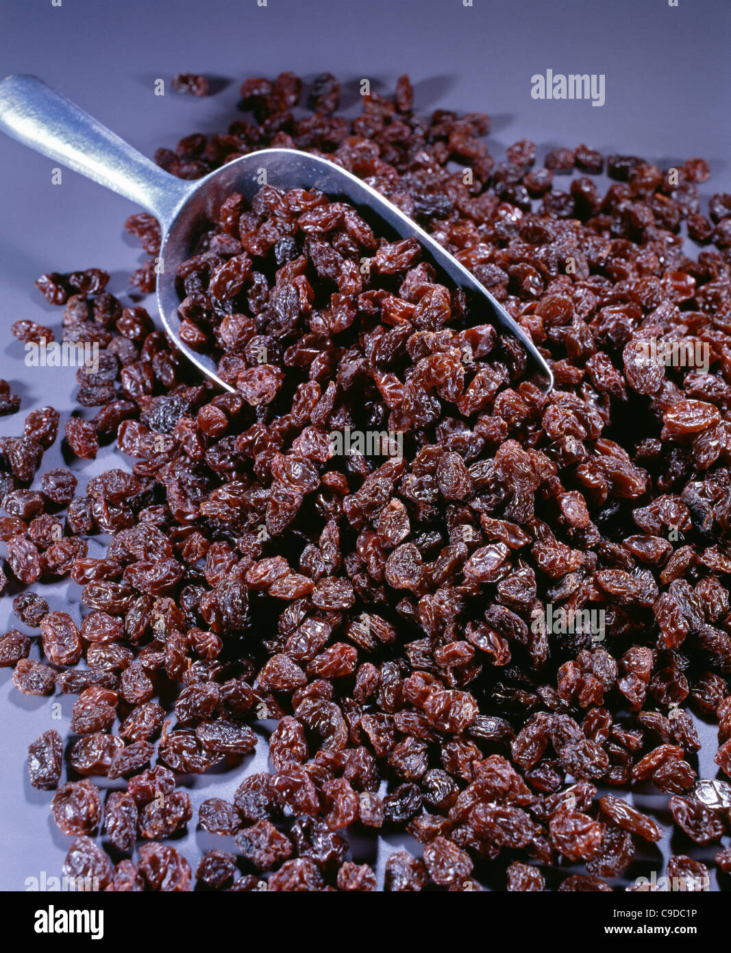 Raisins with scoop Stock Photo - Alamy