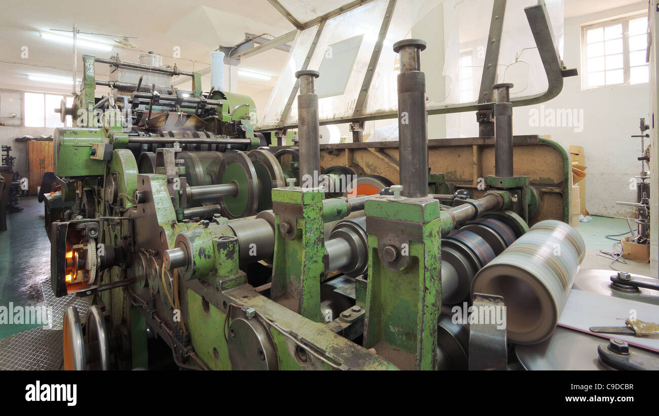 Details of a printing machine inside factory Stock Photo - Alamy