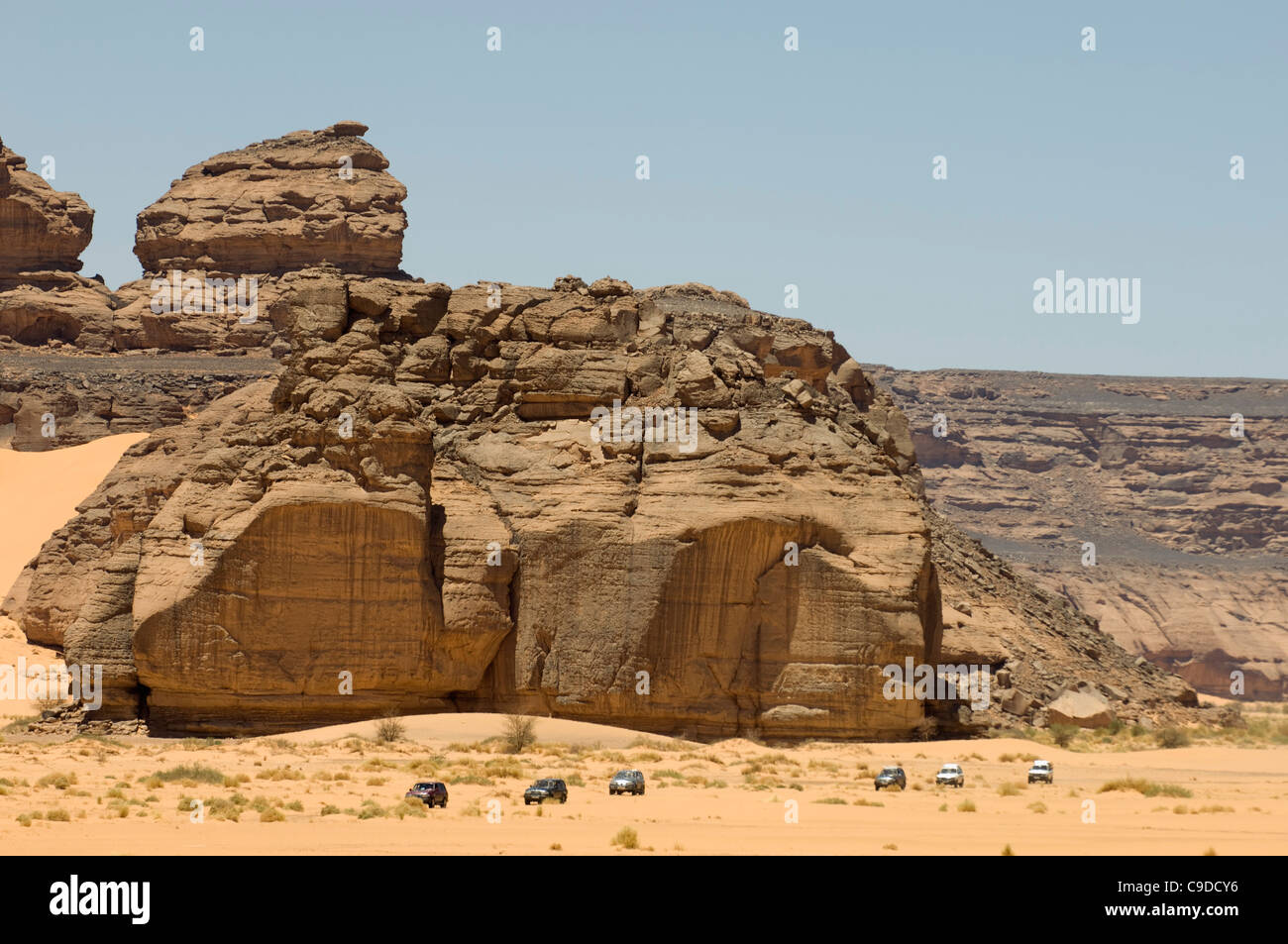 4x4 vehicles near rock formations, Wadi Teshuinat, Tadrart Acacus ...