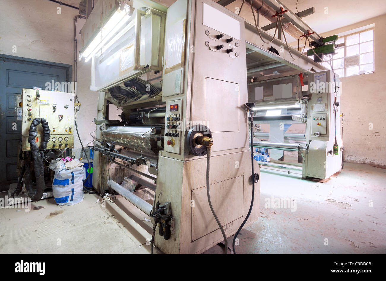 Details of a printing machine inside factory Stock Photo - Alamy