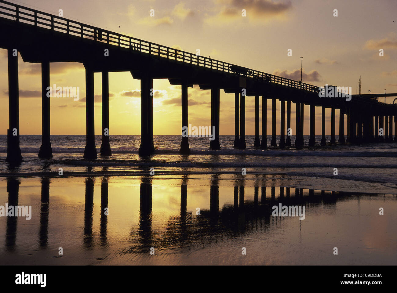 Silhouette of a pier during sunset, Scripps Pier, San Diego, California ...