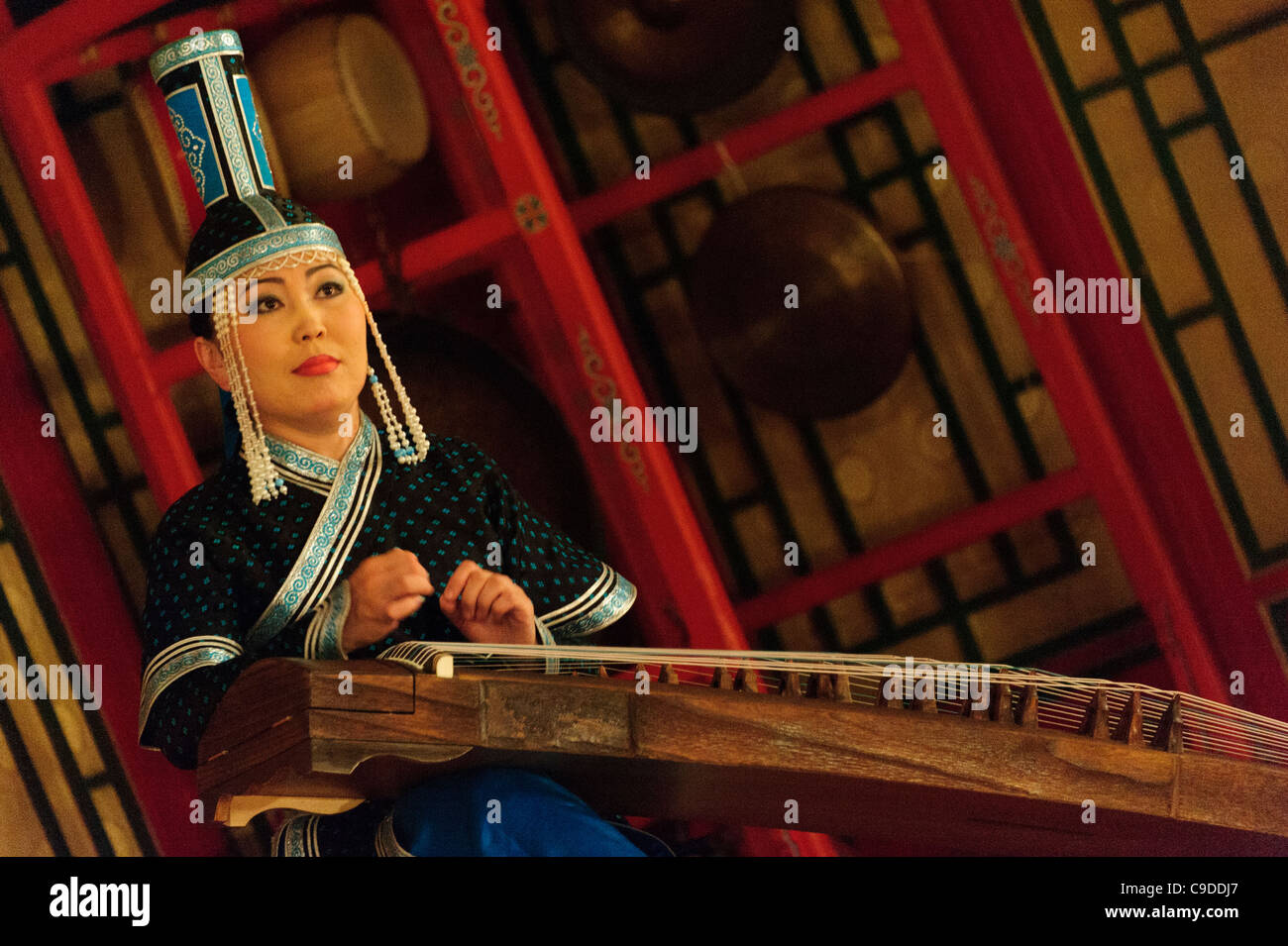 Musician of Tumen Ekh ensemble performs traditional mongolian music in ...