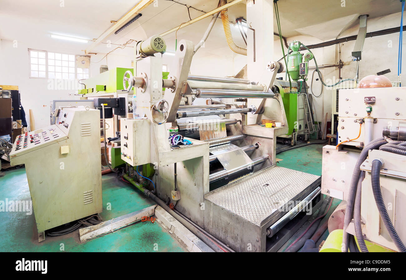 Details of a printing machine inside factory Stock Photo - Alamy