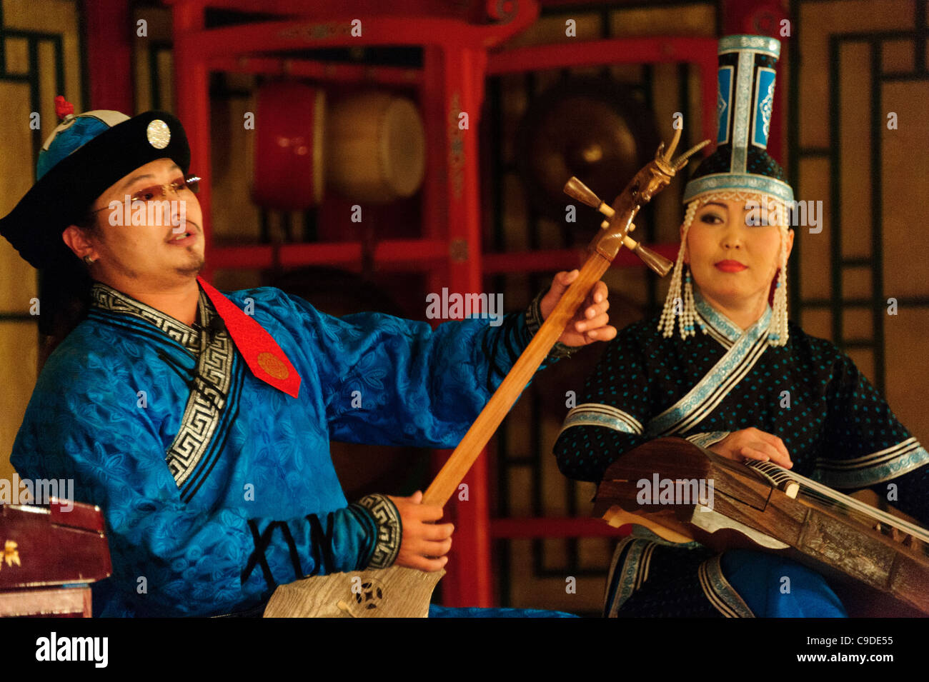 Musician of Tumen Ekh ensemble performs traditional mongolian music in ...