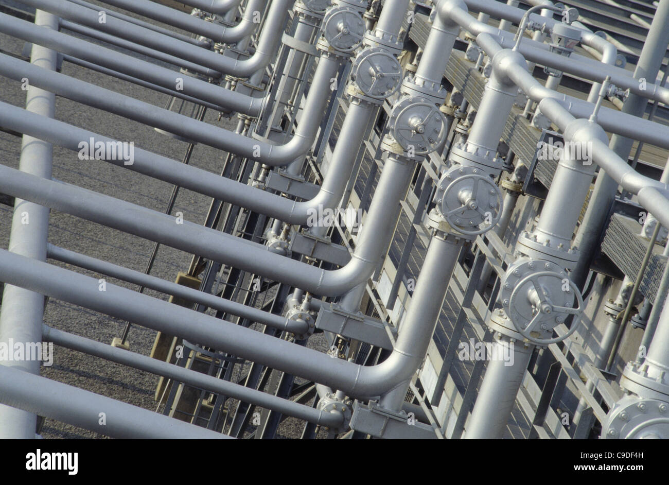 Pipes at an oil refinery Stock Photo - Alamy