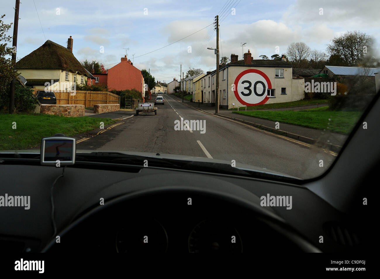 Road sign on house hi-res stock photography and images - Alamy