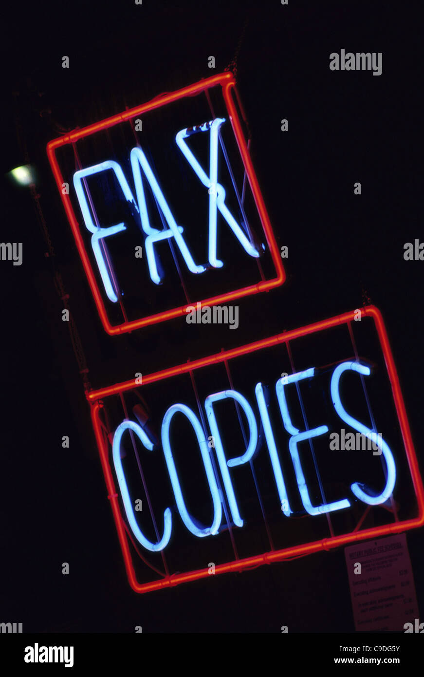 Neon sign for fax and copies Stock Photo - Alamy