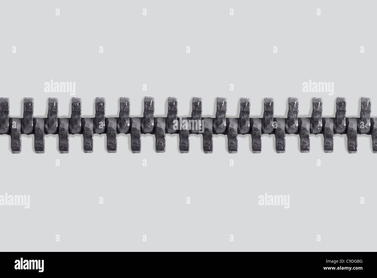 studio photography of a long zipper half closed, in light back Stock ...