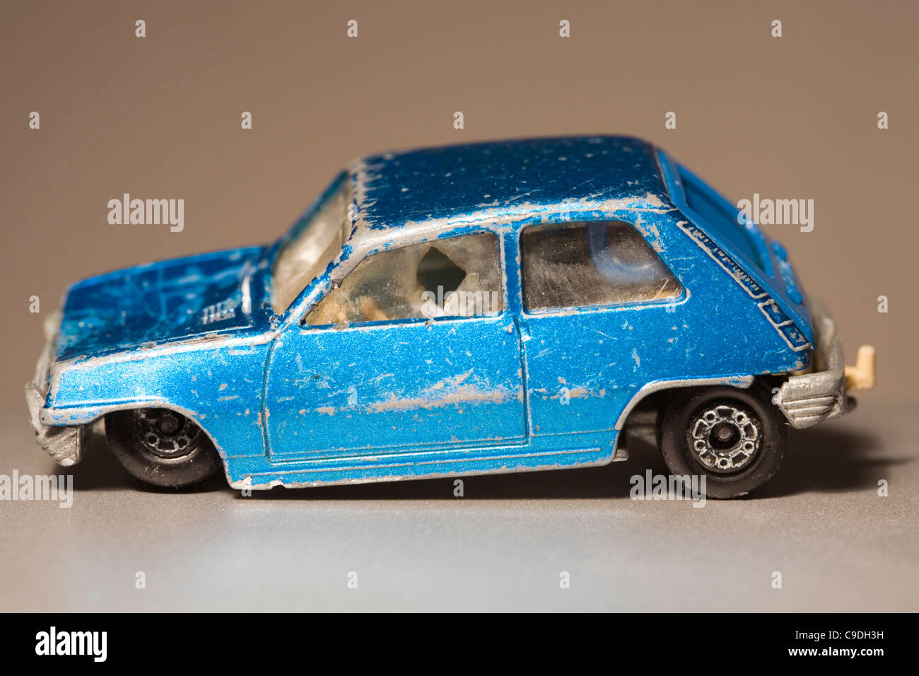 Close-up of a damaged toy car Stock Photo - Alamy
