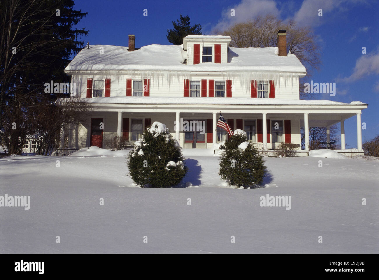 House in a snow covered landscape Stock Photo - Alamy