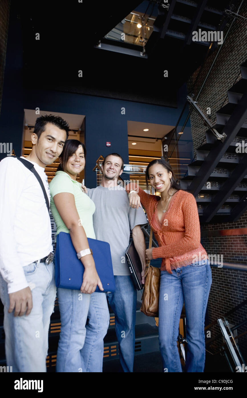 Portrait of university students hanging out between classes Stock Photo ...