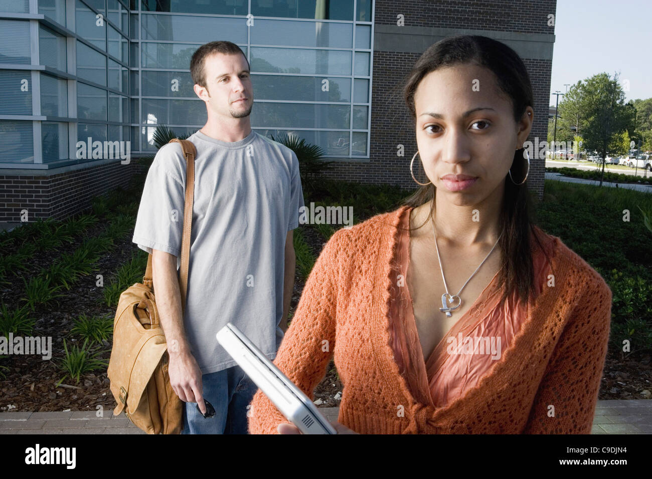 University students standing outside campus building Stock Photo - Alamy