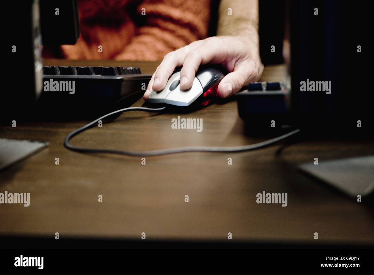 Close-up of a human hand using computer mouse Stock Photo - Alamy