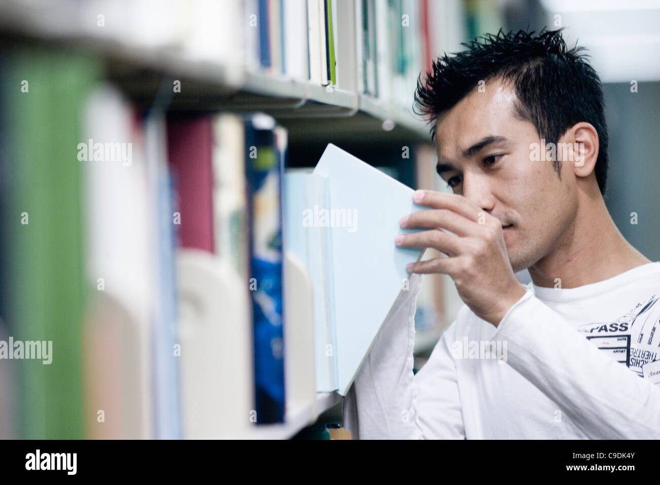 Removing book hi-res stock photography and images - Alamy
