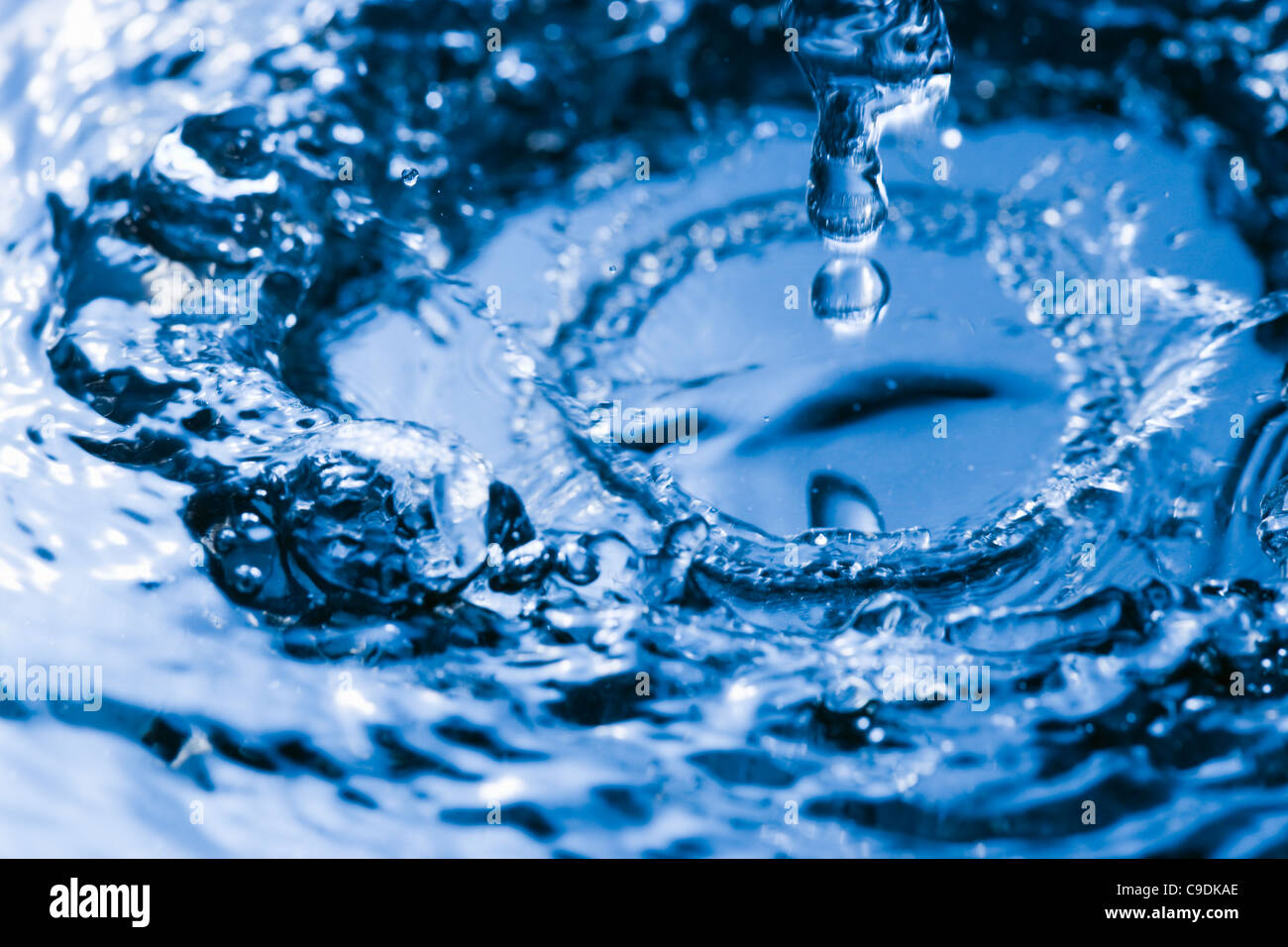 Pouring water splash Stock Photo - Alamy