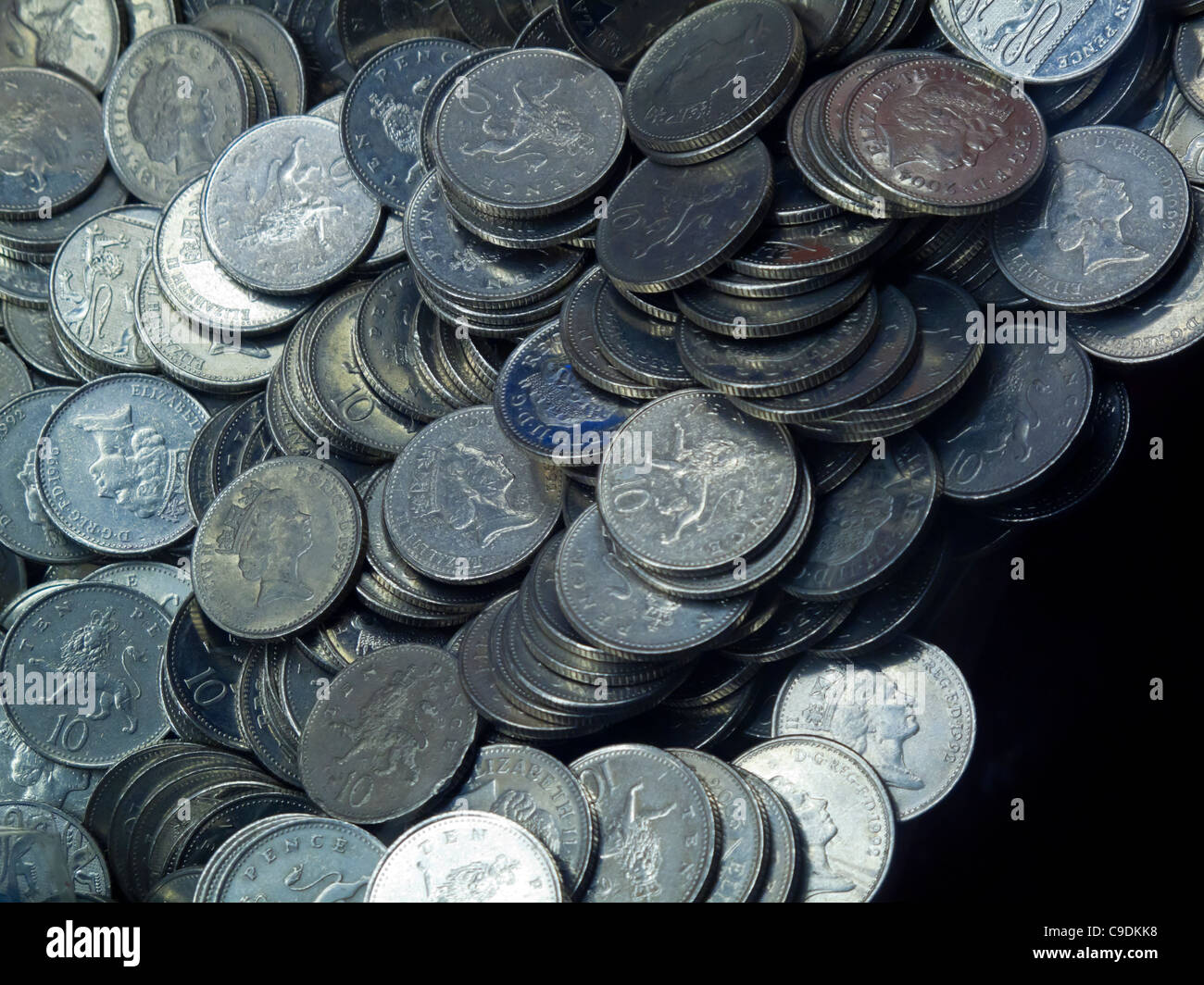 British ten pence coins in an amusement arcade coin waterfall game ...