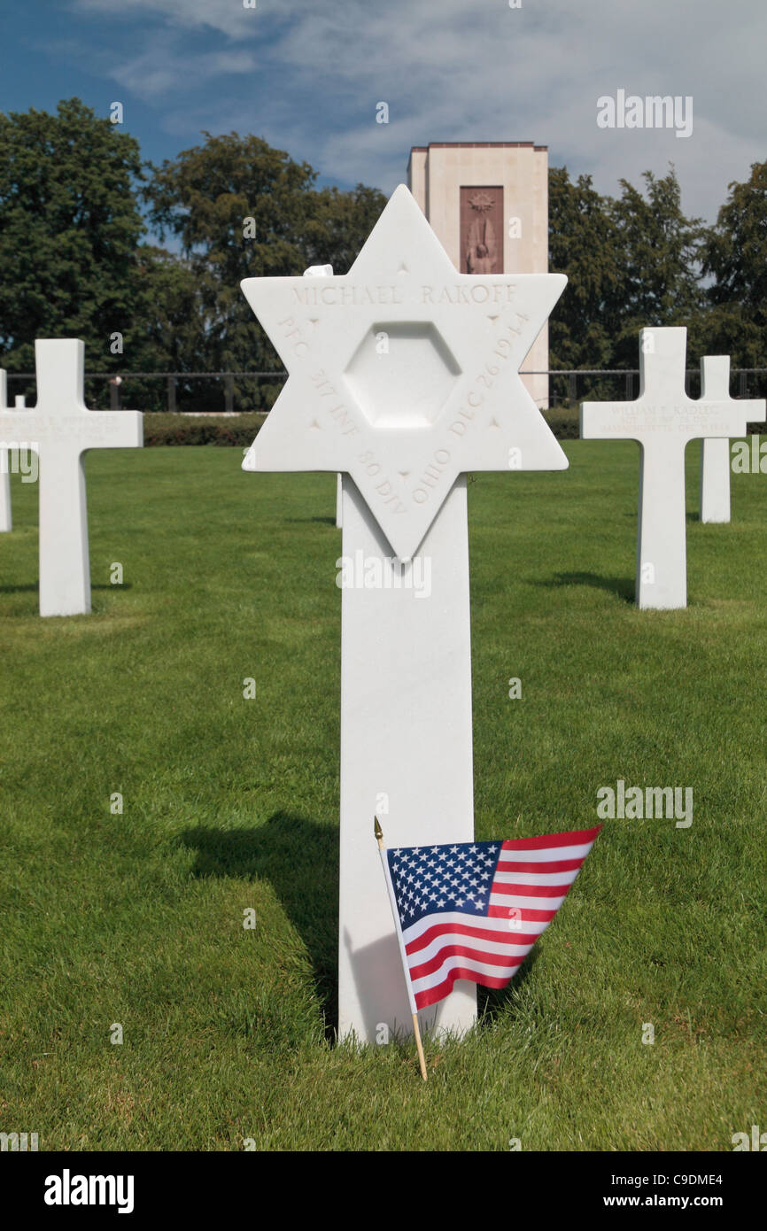 A Jewish headstone with an American flag in the Luxembourg American ...