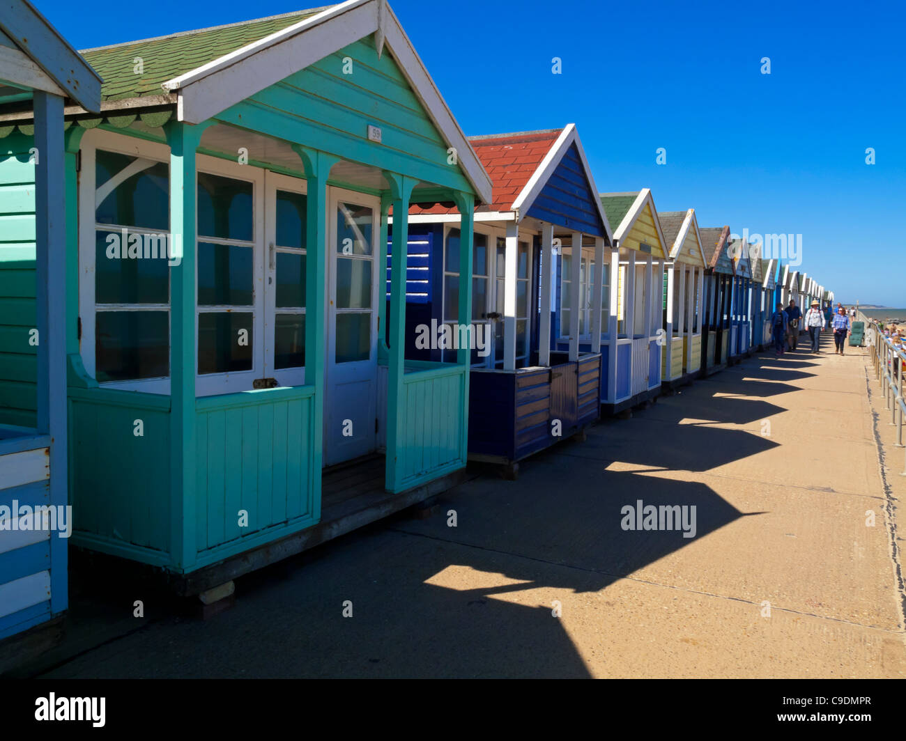 Brightly painted beach huts southwold hi-res stock photography and ...
